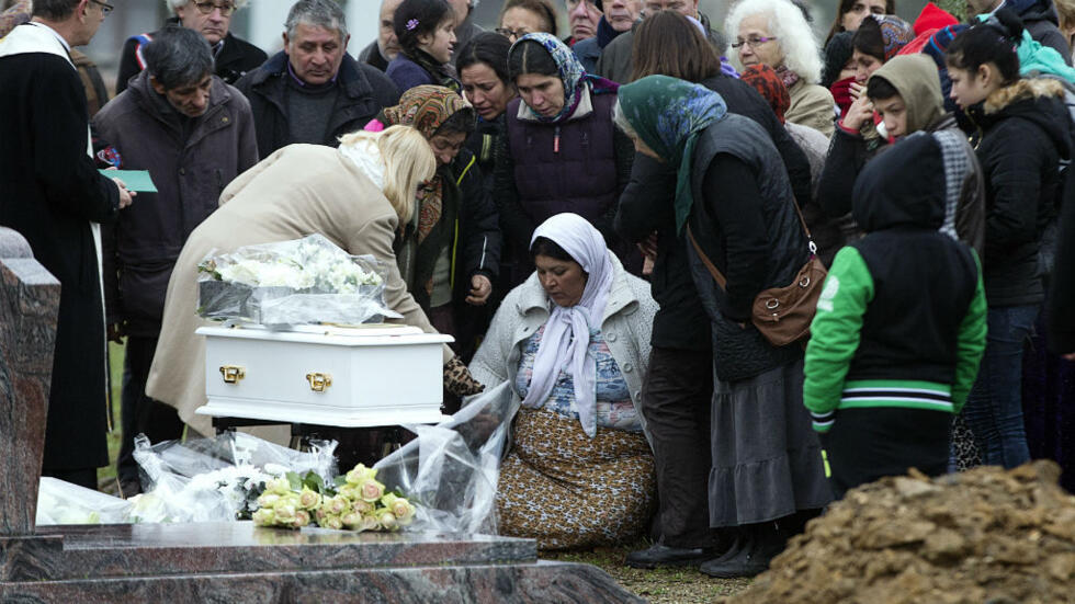 Family Baby Crying At Funeral