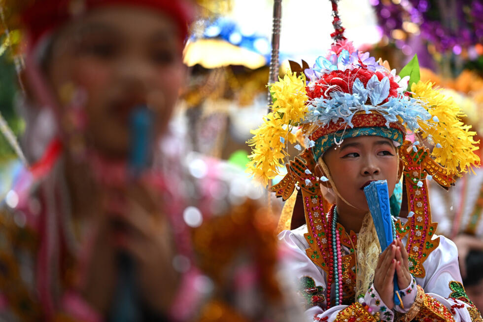Flowers in their hair: Shan boys ordained into Buddhist monkhood