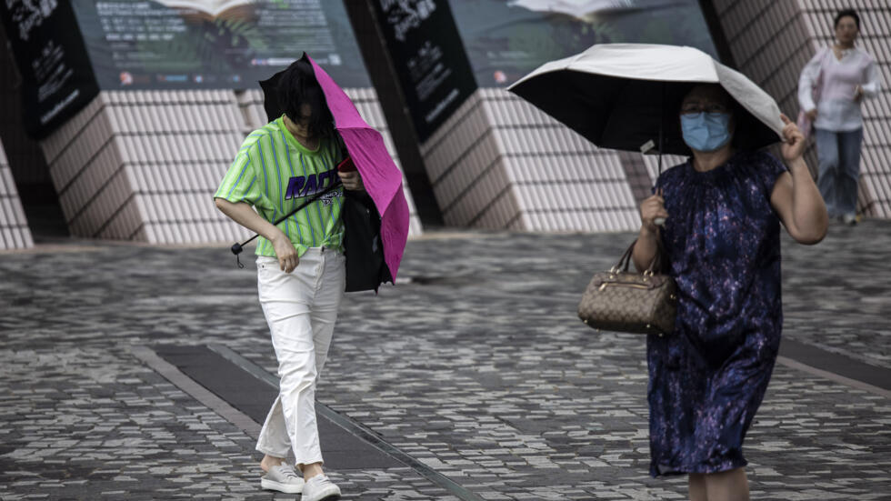 Thousands evacuated as typhoon pummels southern China, Vietnam