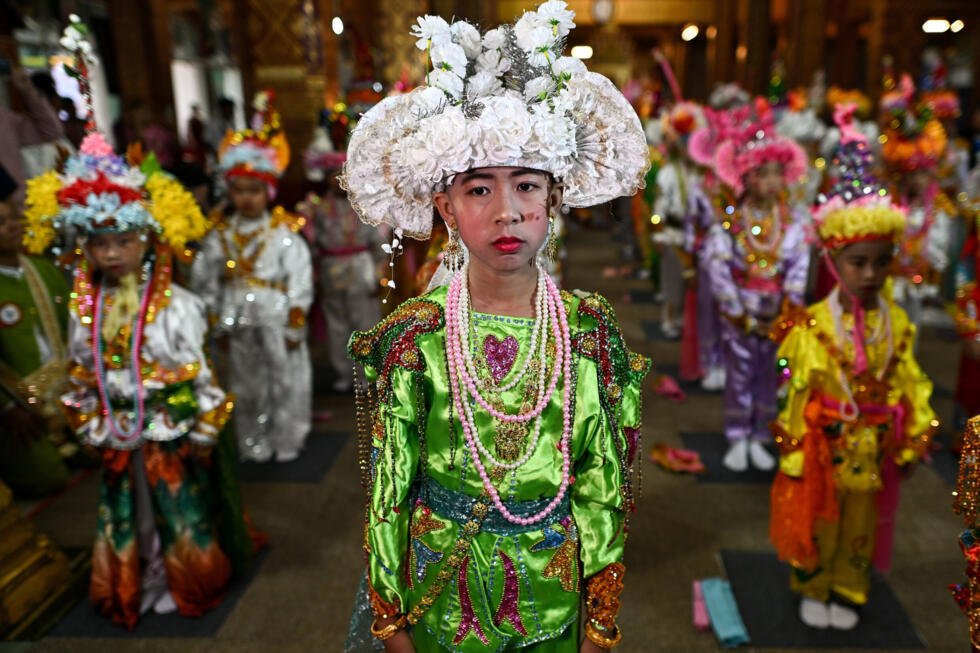 Flowers in their hair: Shan boys ordained into Buddhist monkhood