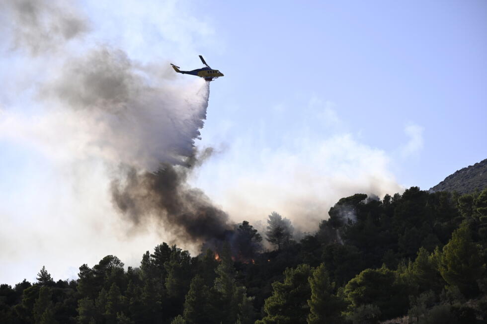Greek firefighters battle major blazes on multiple fronts