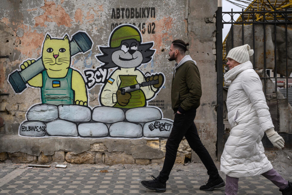 Ukrainian graffiti artists thumb their nose at war in Odessa