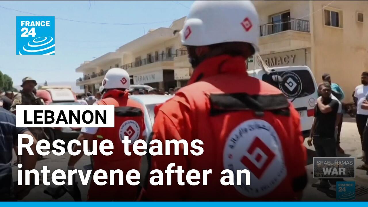 'Rescue teams examined the remains of a charred vehicle' in Lebanon ...