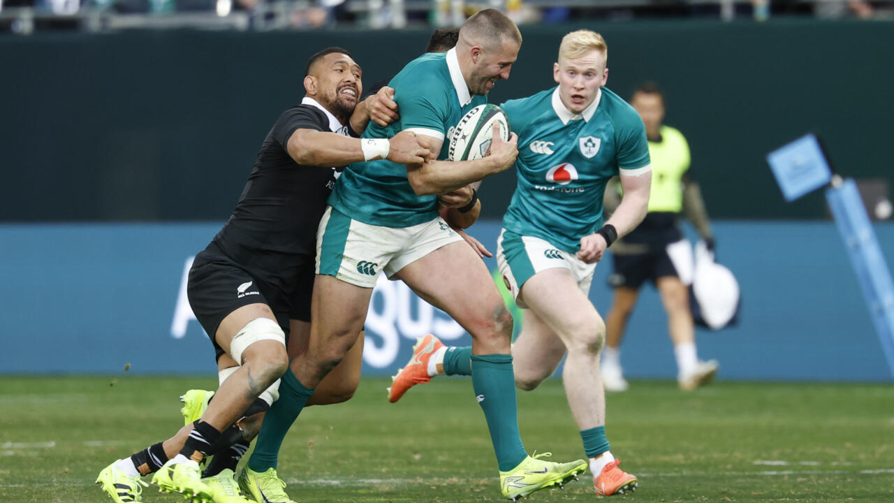 All Blacks sink 14-man Ireland 26-13 in Chicago Test