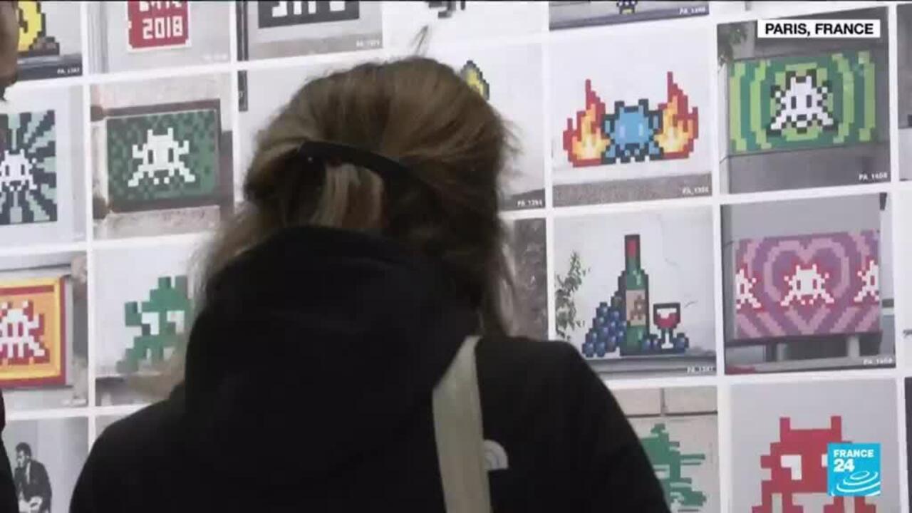 Works by street artist Invader go on display in Paris exhibition ...
