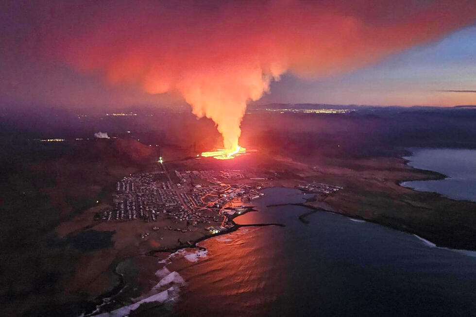 Houses catch fire as volcano erupts in southwestern Iceland
