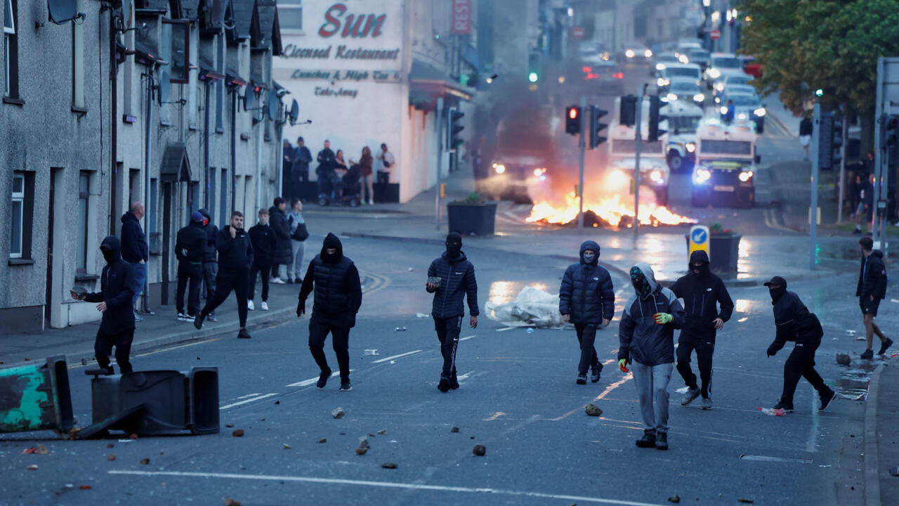 'Racially motivated' attacks spark second night of unrest in Northern ...