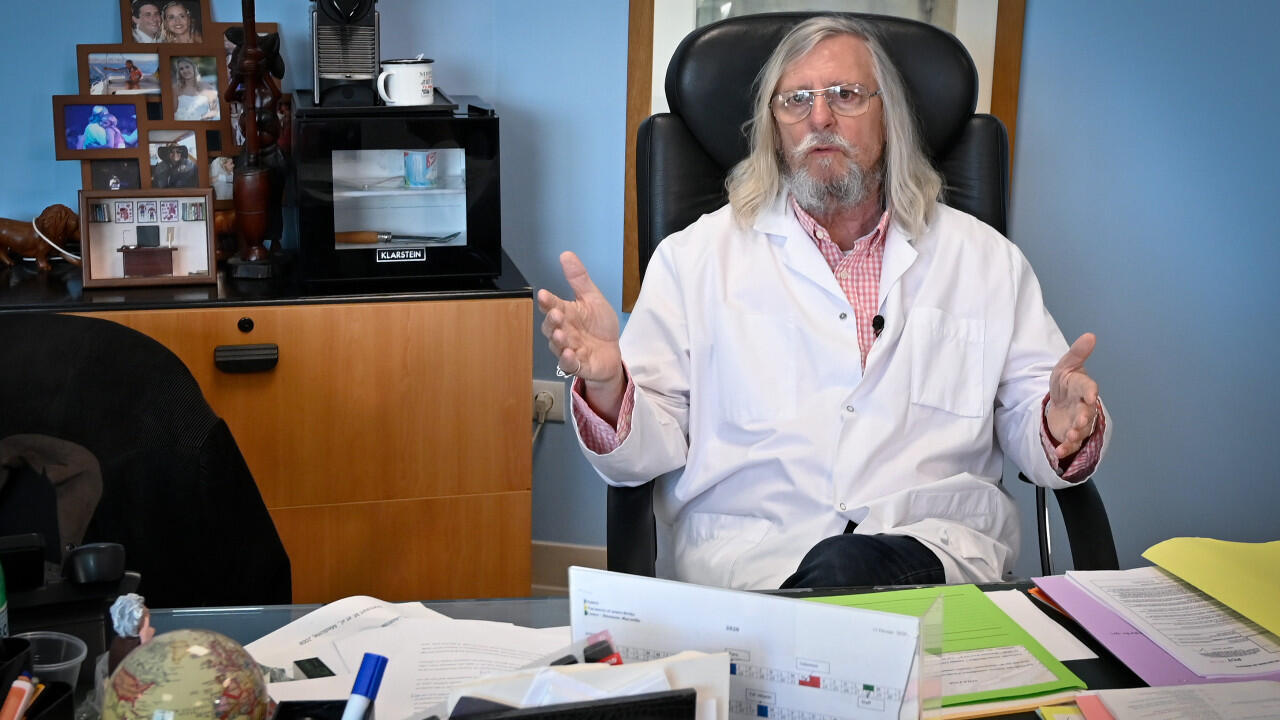 Macron visits French doctor behind hydroxychloroquine coronavirus 'cure ...