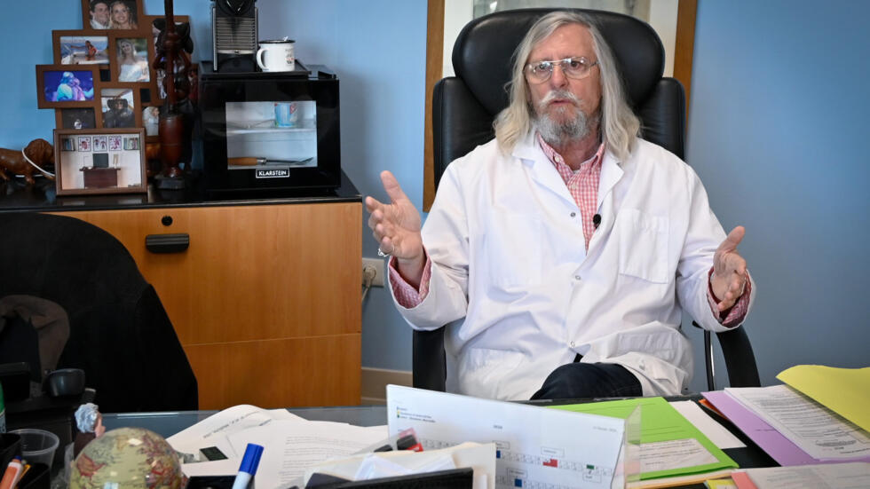 Macron visits French doctor behind hydroxychloroquine coronavirus 'cure ...