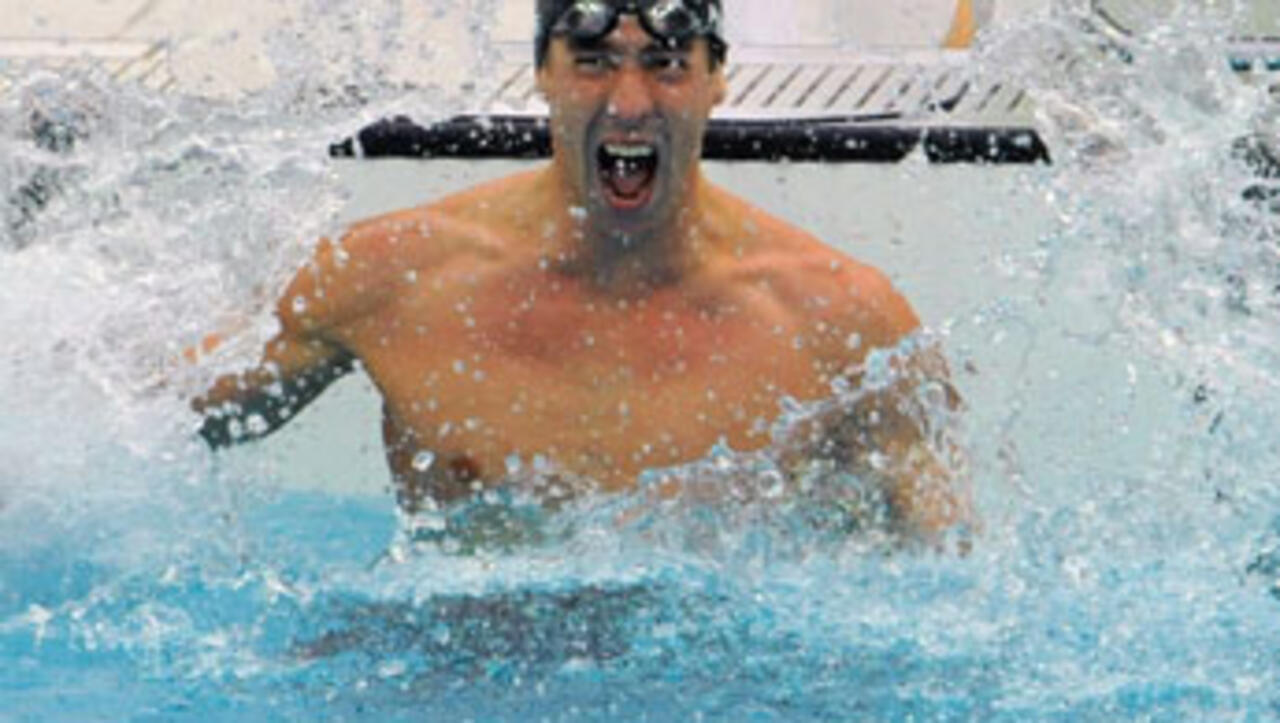 Phelps clinches seventh gold, matches Spitz's record